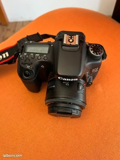 Canon 70 with 50 mm touchscreen & flip display full box | Items | Qatar ...