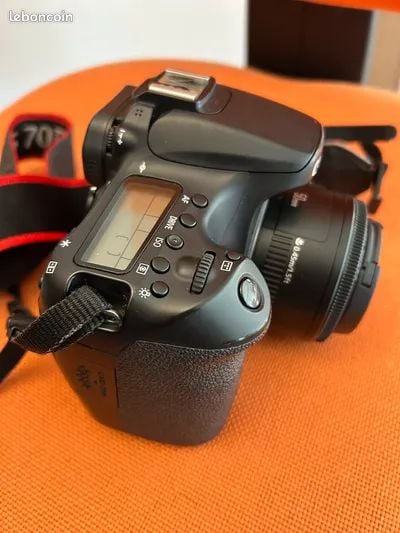 Canon 70 with 50 mm touchscreen & flip display full box | Items | Qatar ...